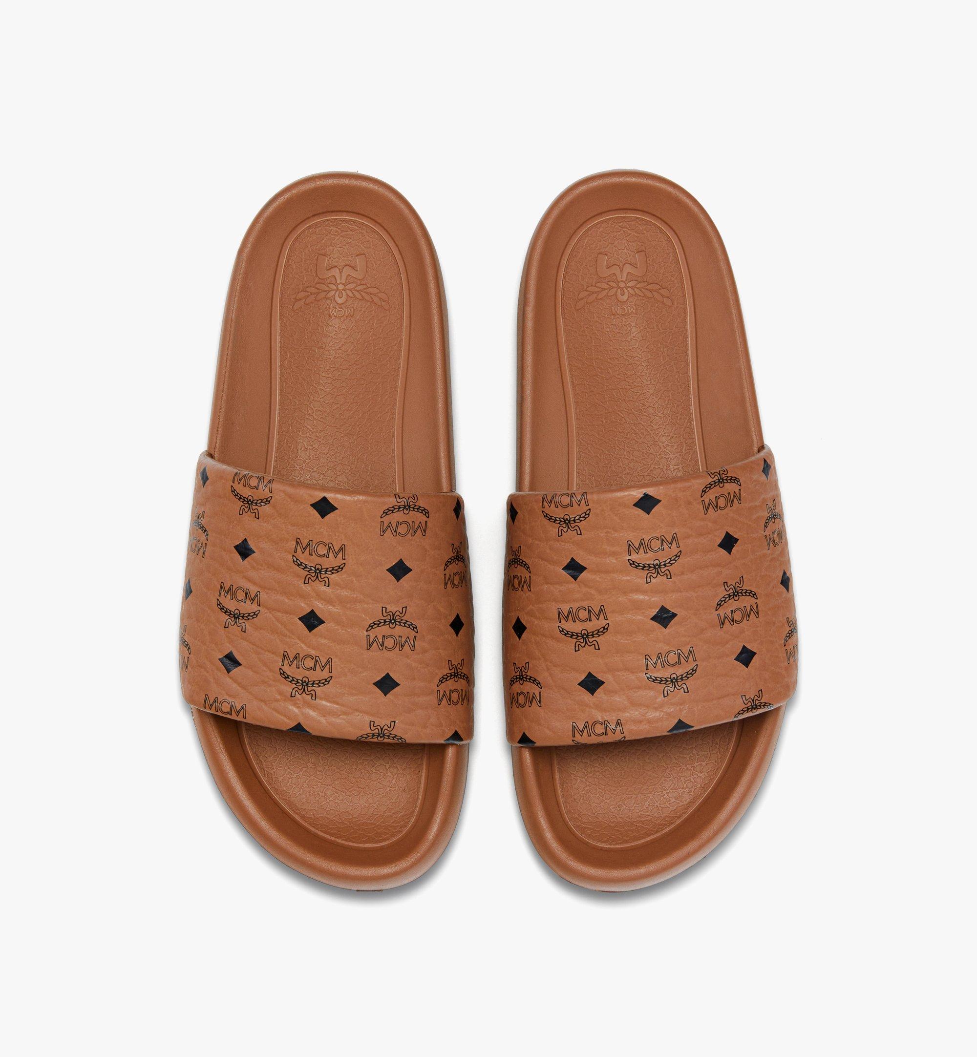 42 IT Monogram Print Rubber Slides Cognac | MCM ®UK