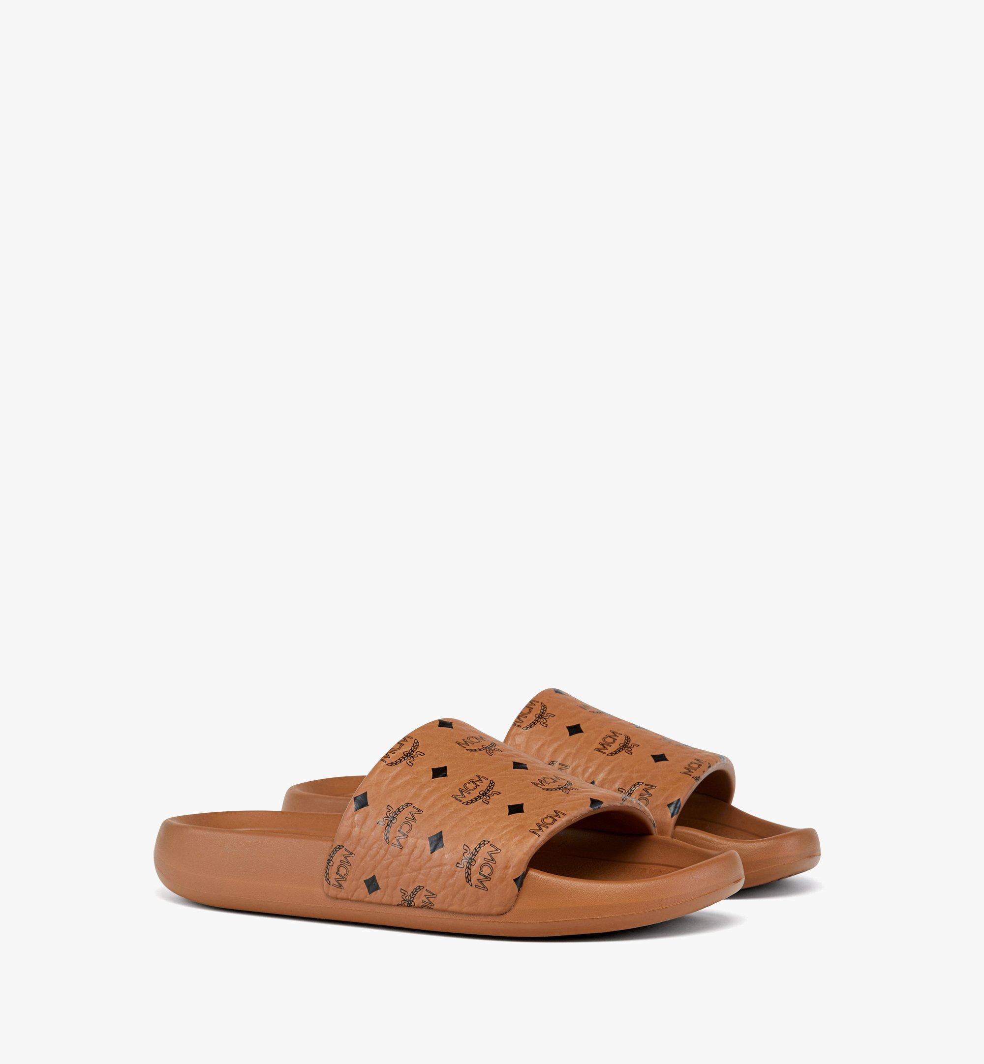 44 IT Monogram Print Rubber Slides Cognac | MCM ®US
