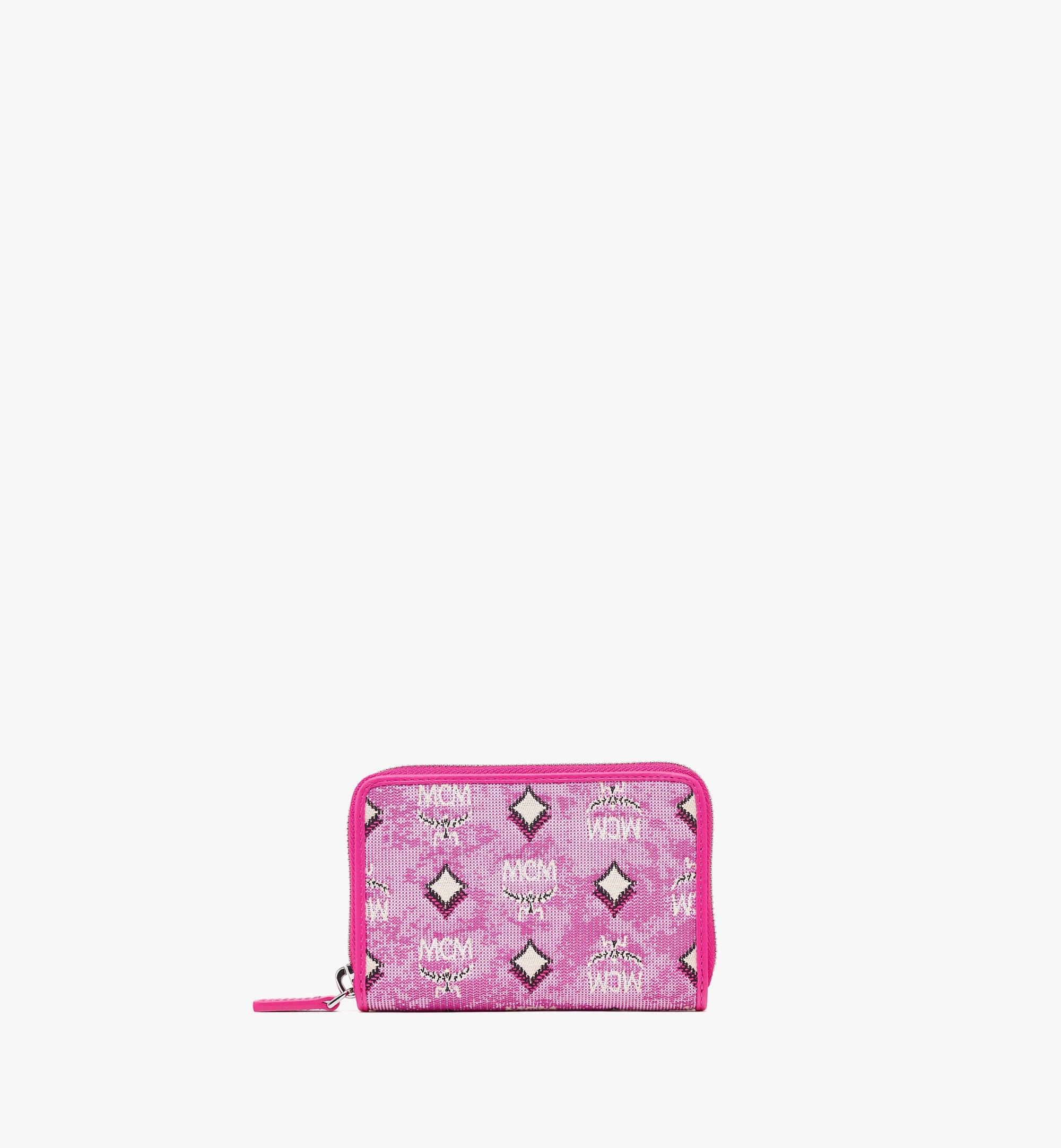 Designer Leather Bi-Fold & Chain Wallets | MCM® US