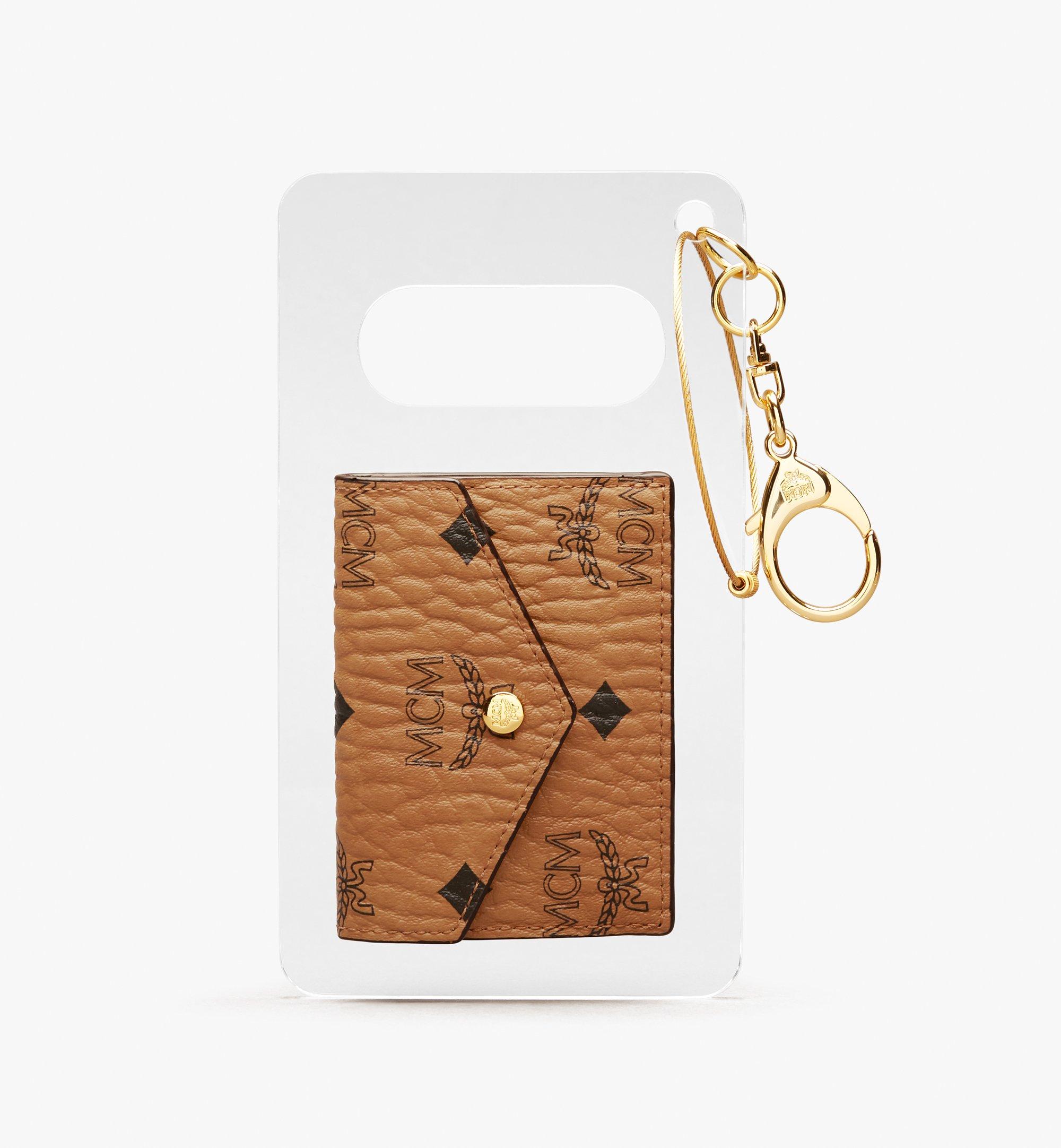 Mini MCM by PHENOMENON Acrylic Disk Coin Pouch in Visetos Cognac | MCM ®TH