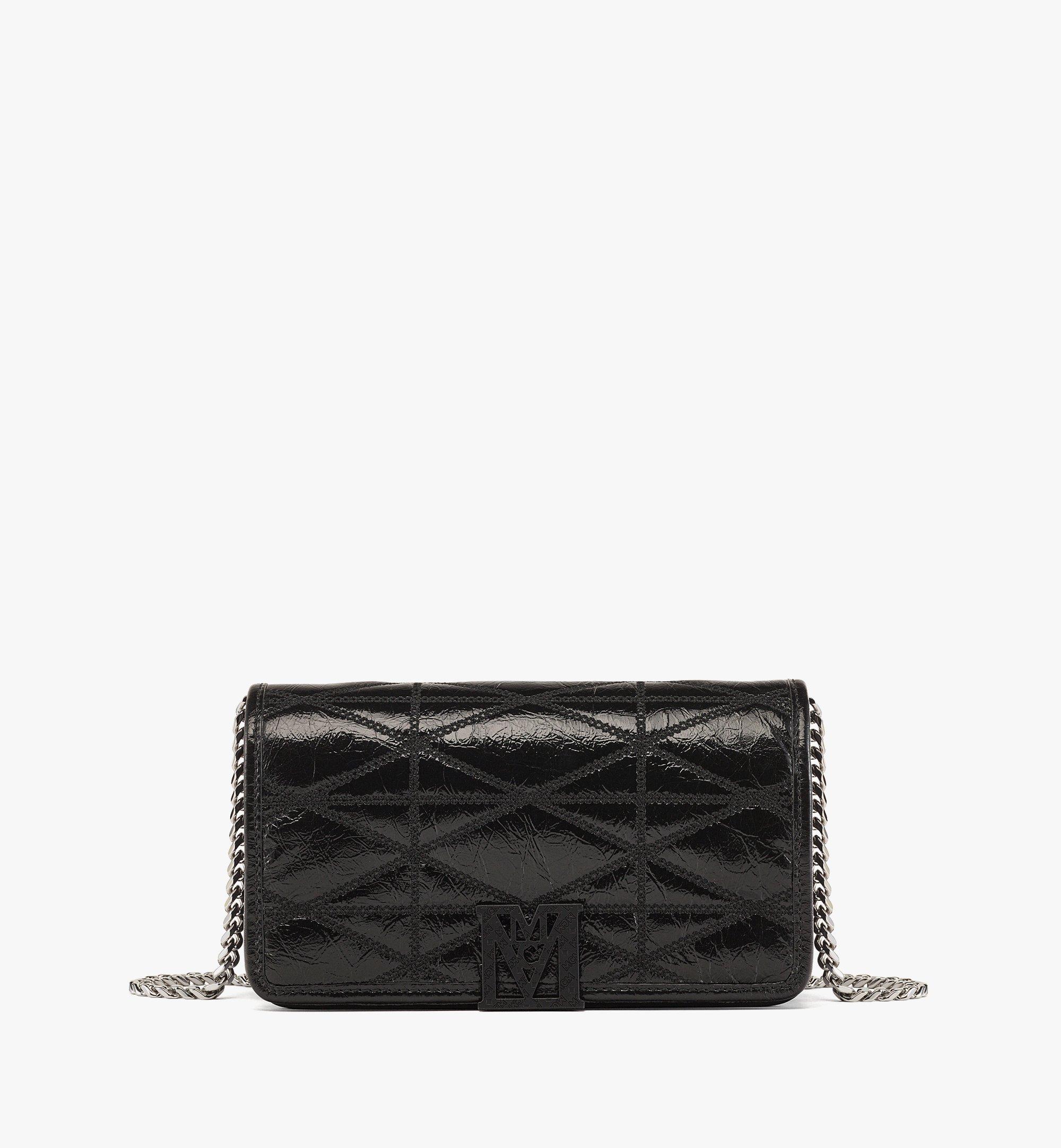 Large Travia Quilted Chain Wallet in Crushed Leather Black | MCM ®DE