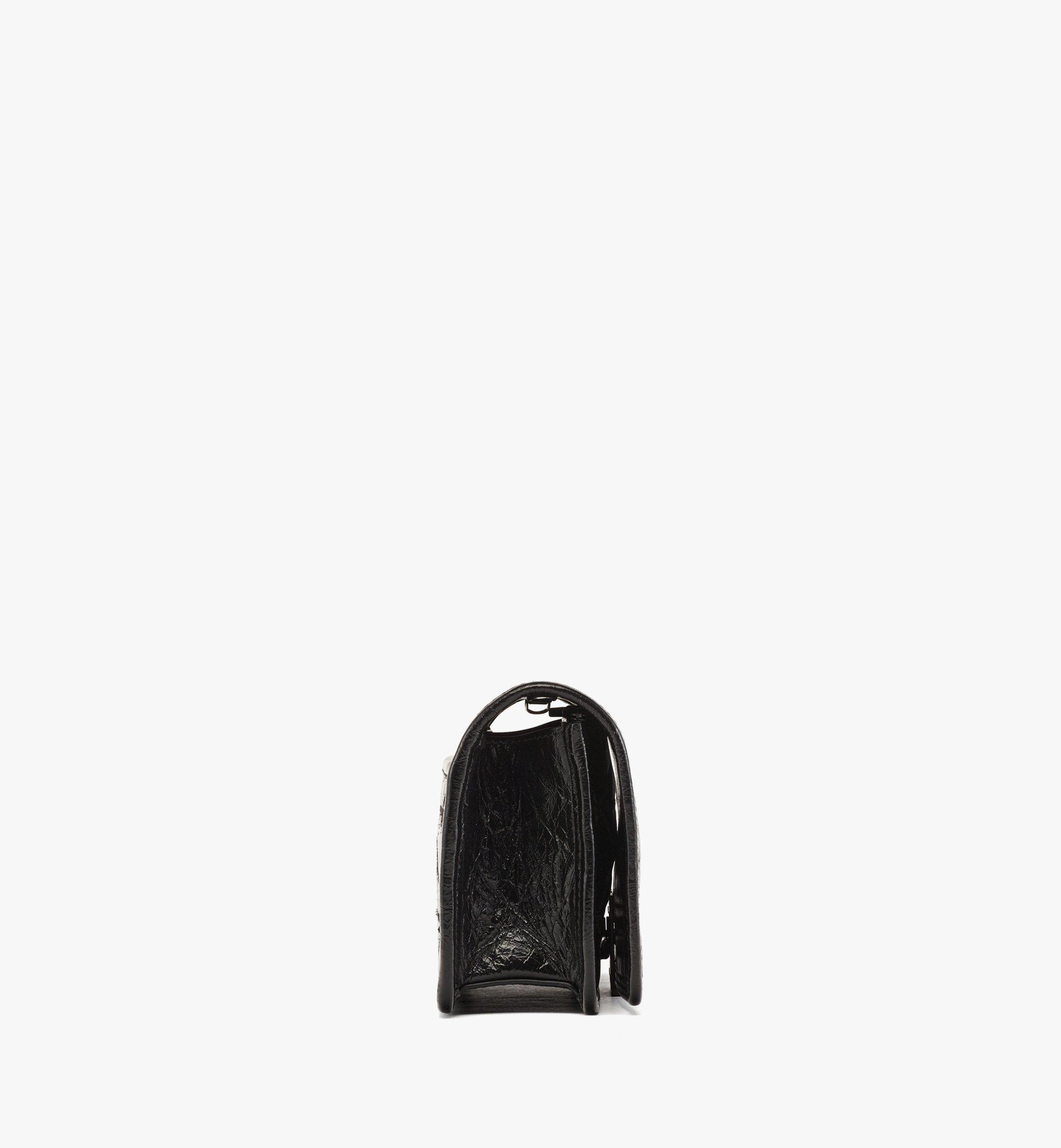 Large Travia Quilted Chain Wallet in Crushed Leather Black | MCM ®DE