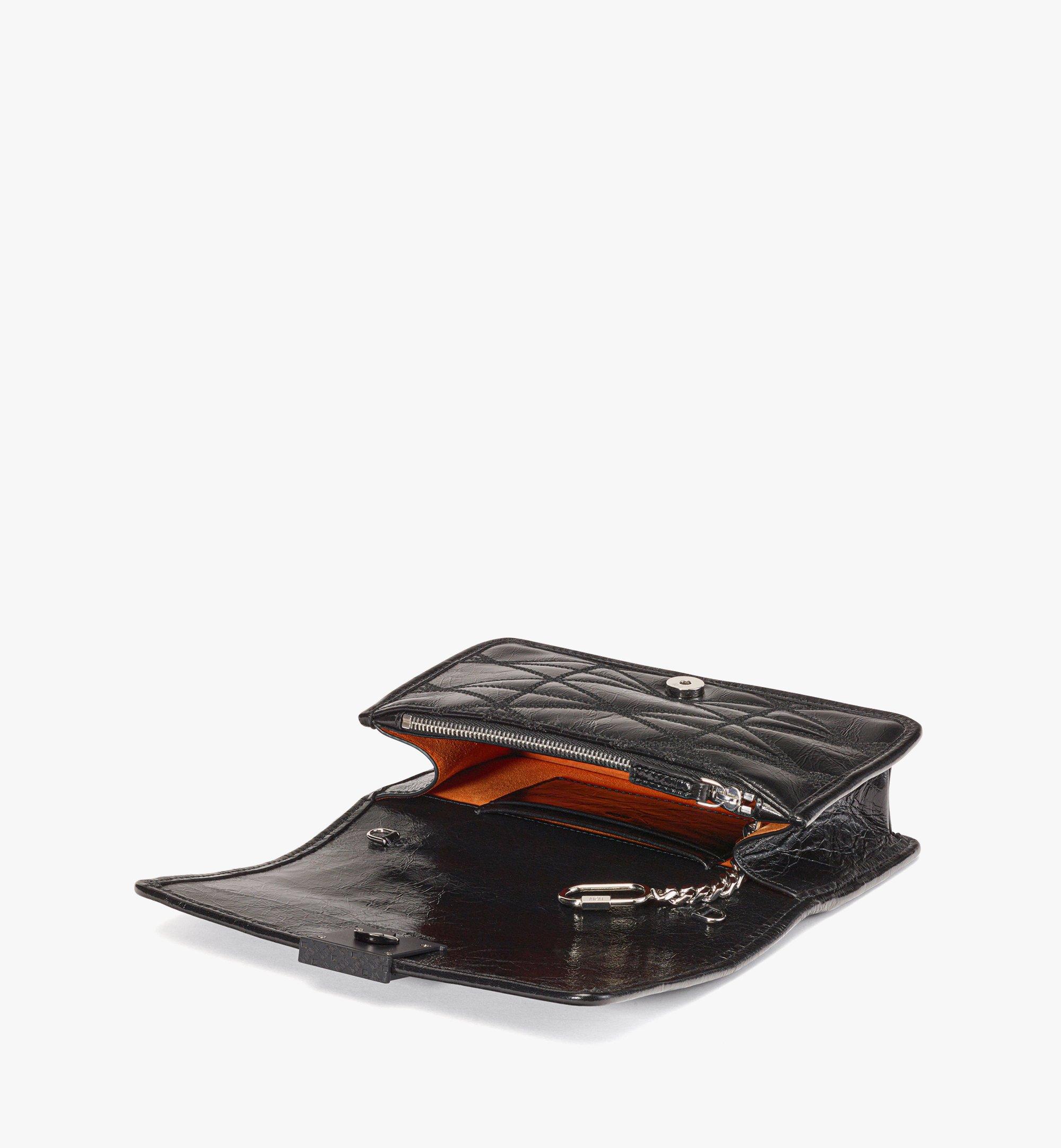 Large Travia Quilted Chain Wallet in Crushed Leather Black | MCM ®DE