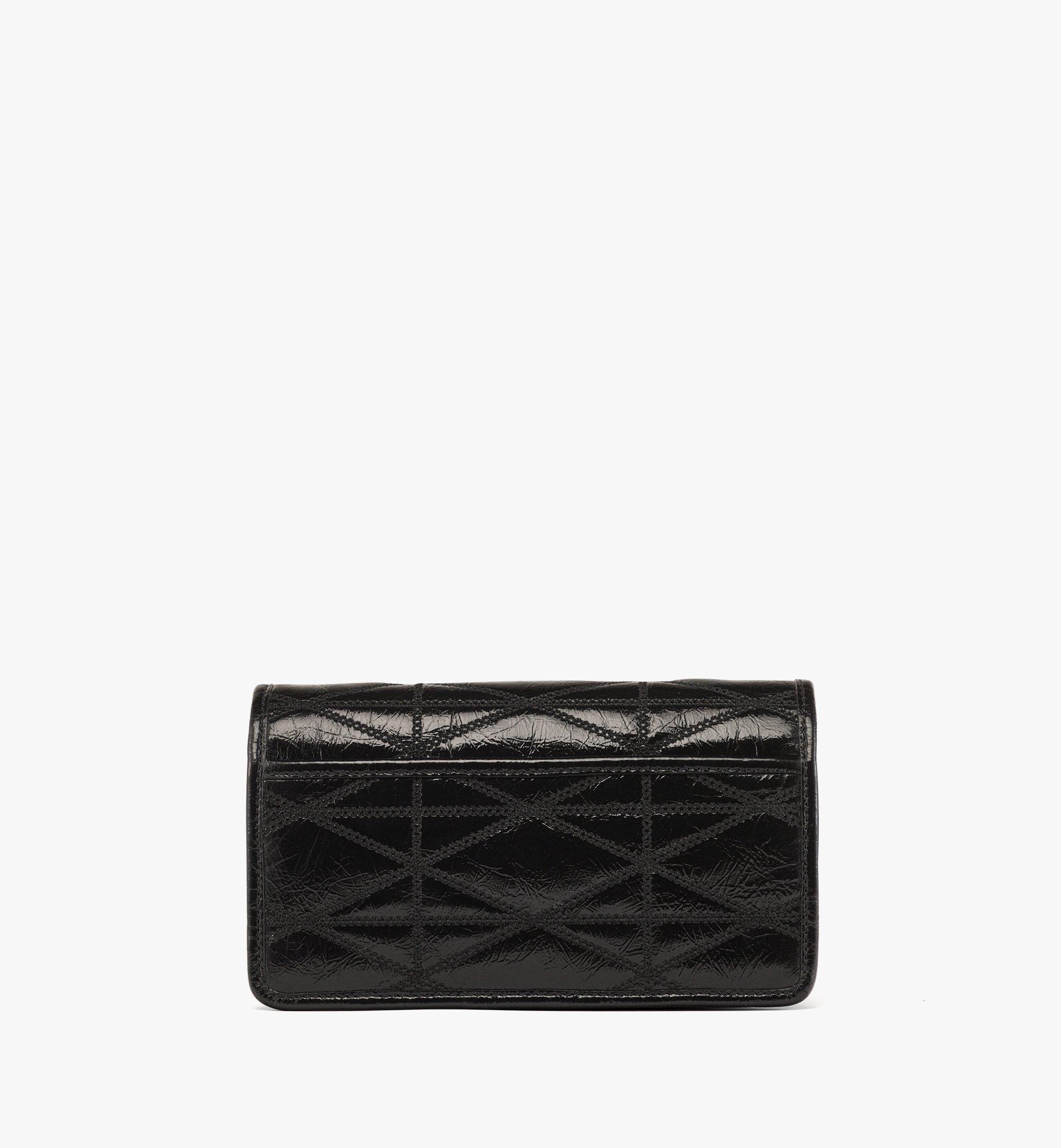 Large Travia Quilted Chain Wallet in Crushed Leather Black | MCM ®DE
